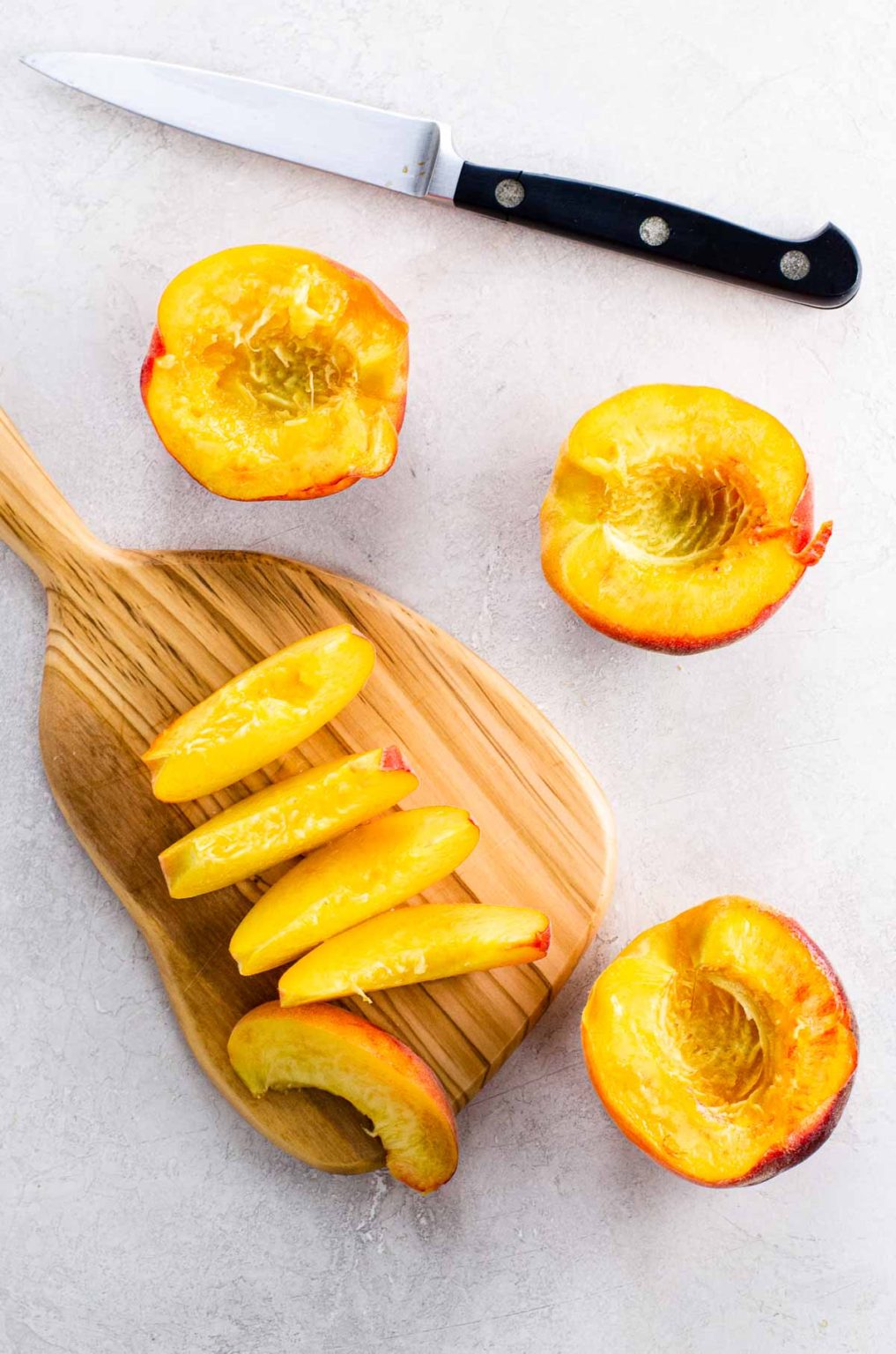 How to Cut a Peach For Any Recipe (With Video) - Umami Girl