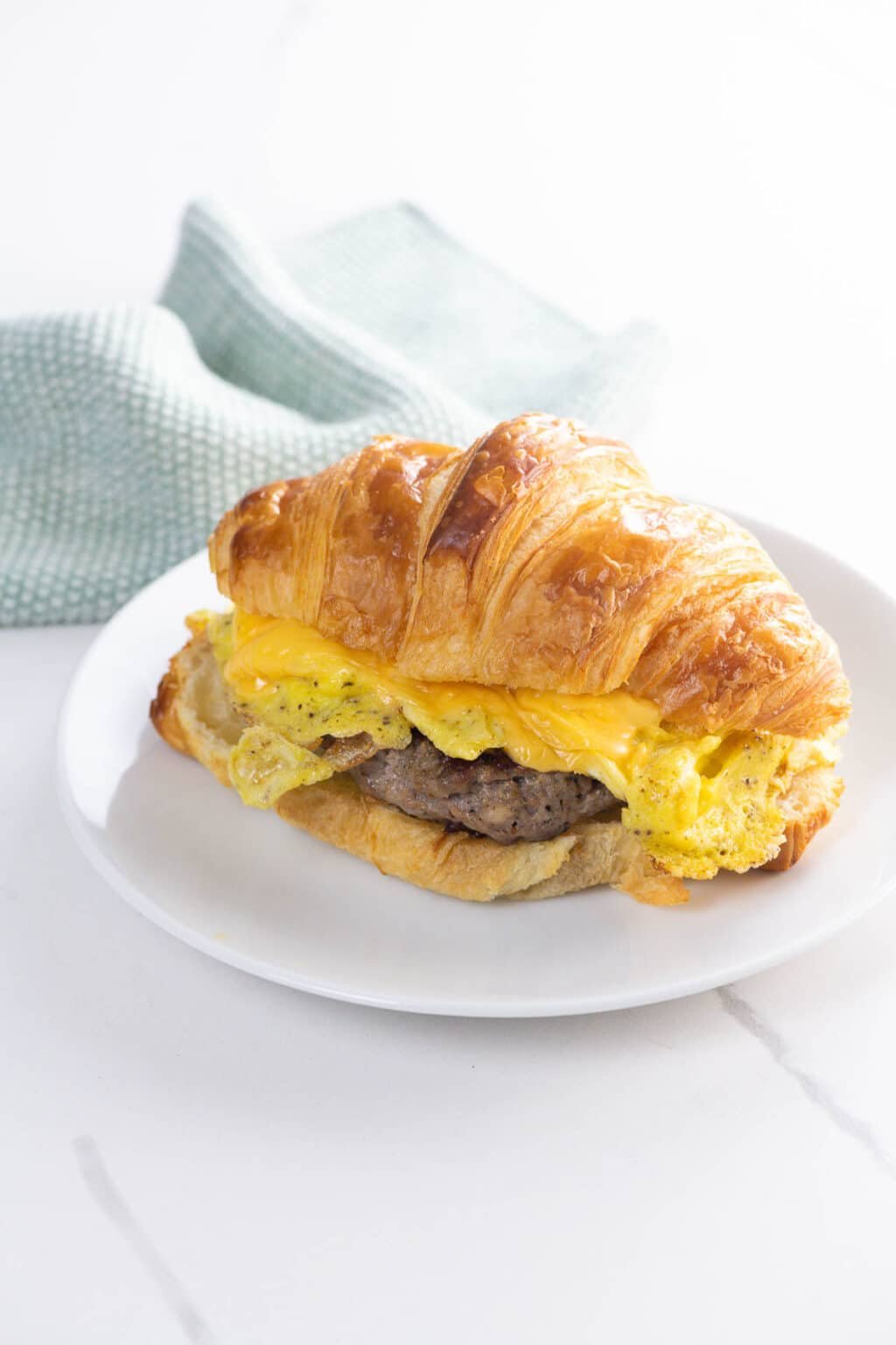 Sausage Egg and Cheese Croissant - Umami Girl